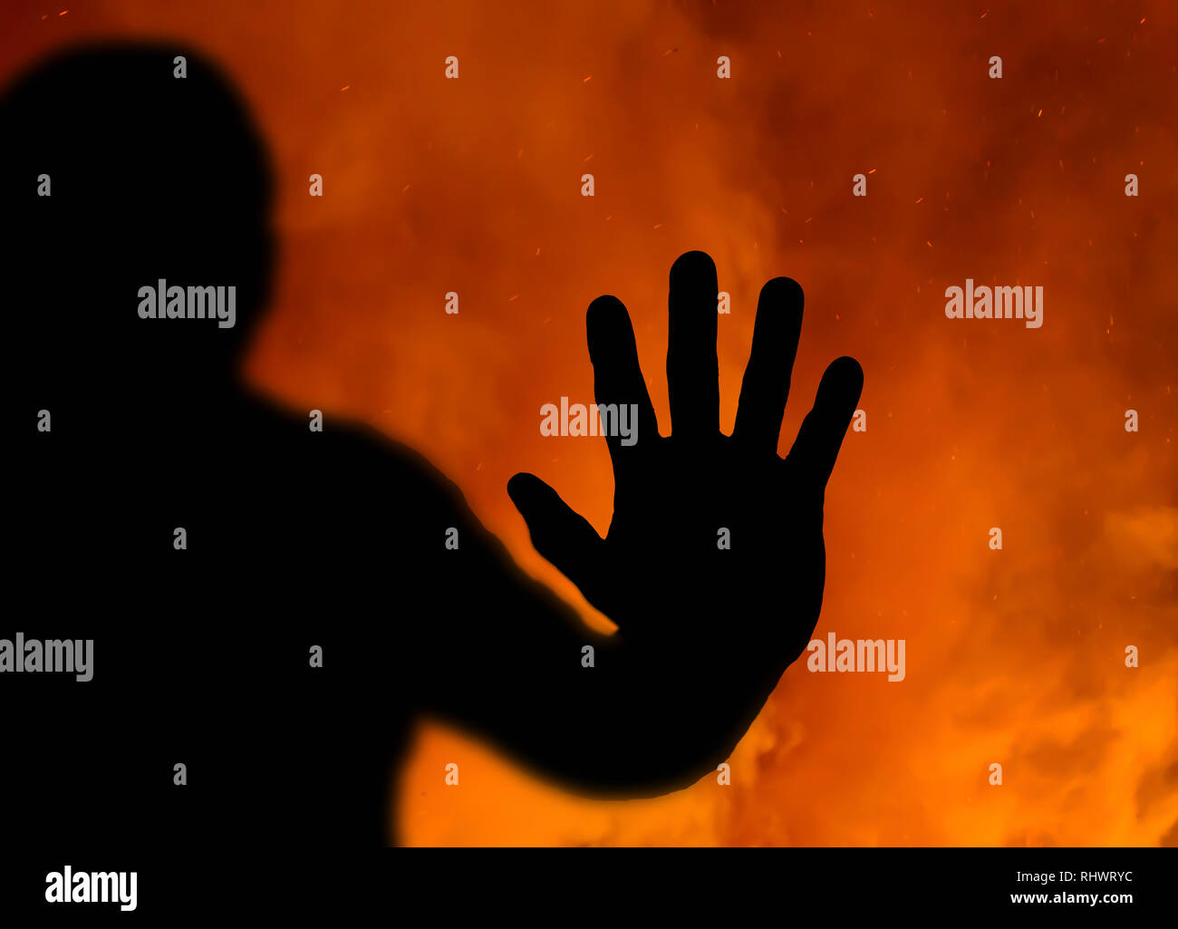 Abstract of a silhouette of the hand pressed up against the inside of a ...