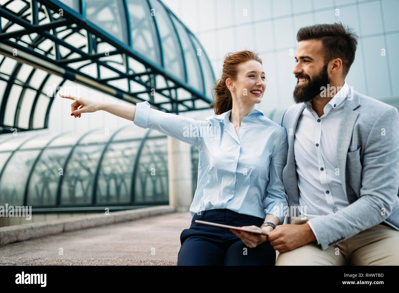 Business people discussing ideas outside Stock Photo - Alamy