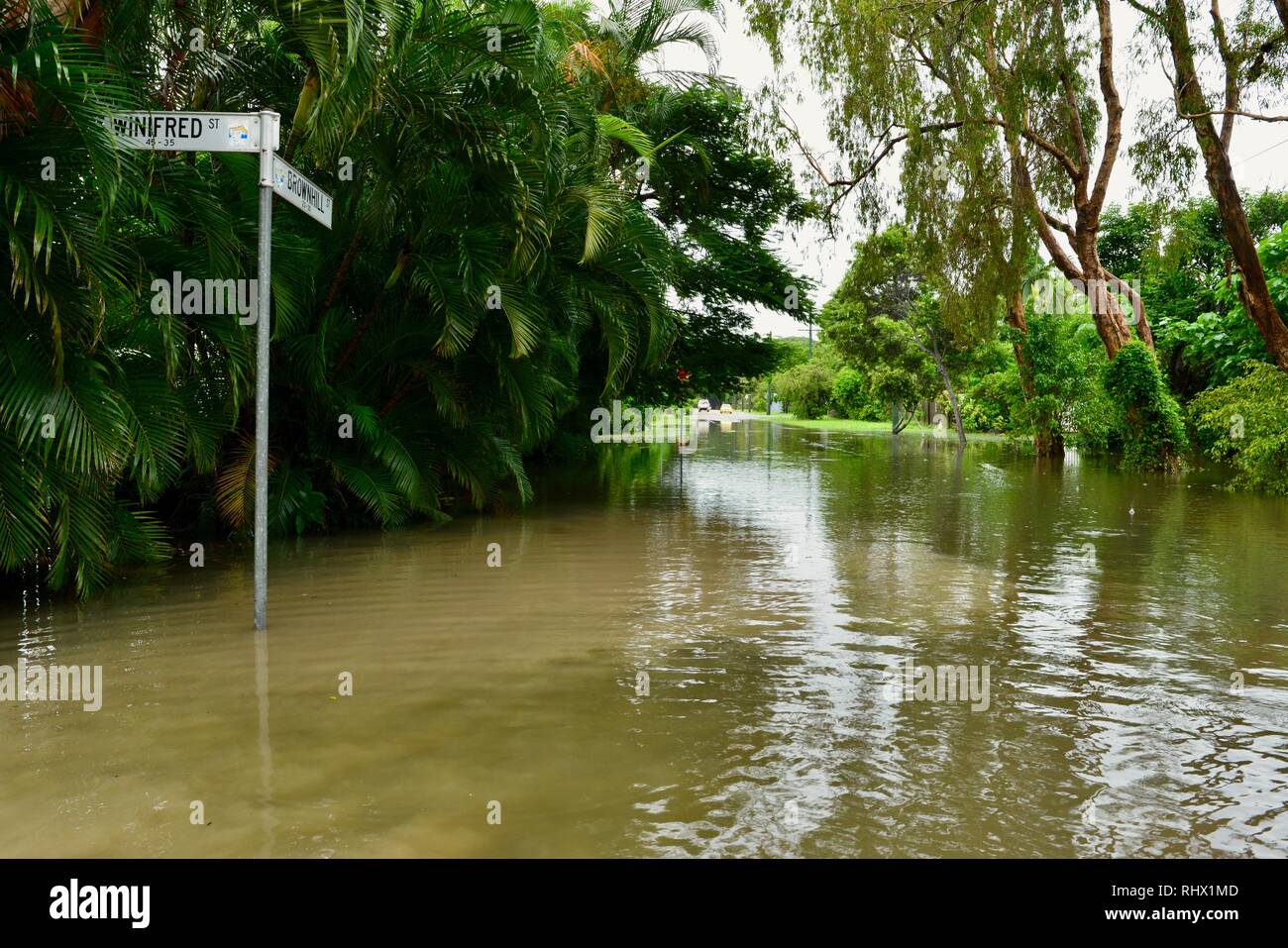 Flooded roads in the suburbs as Ross River breaks it banks for the ...