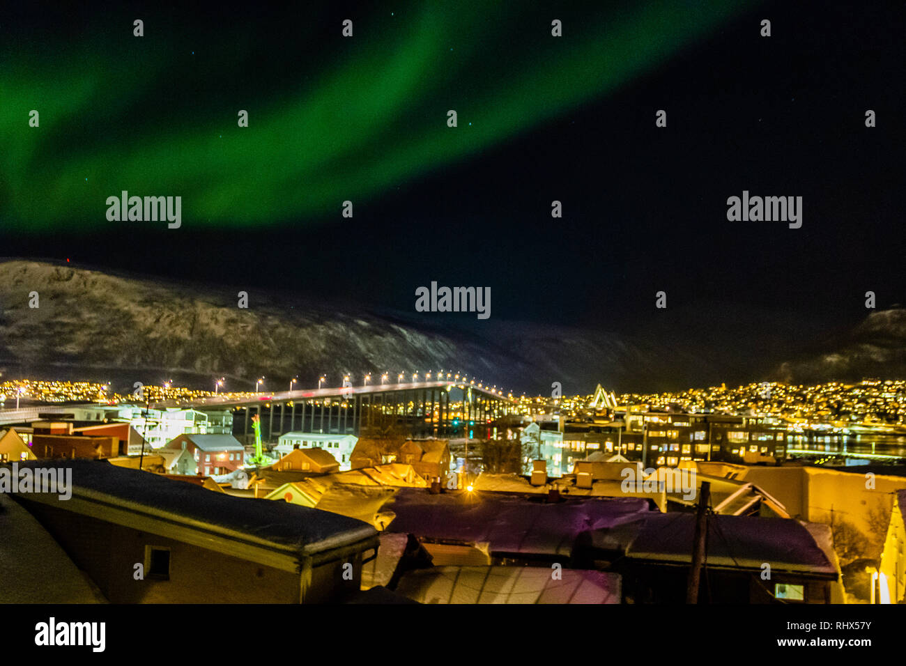 Aurora Borealis or Northern Lights displaying over Tromso, one of ...