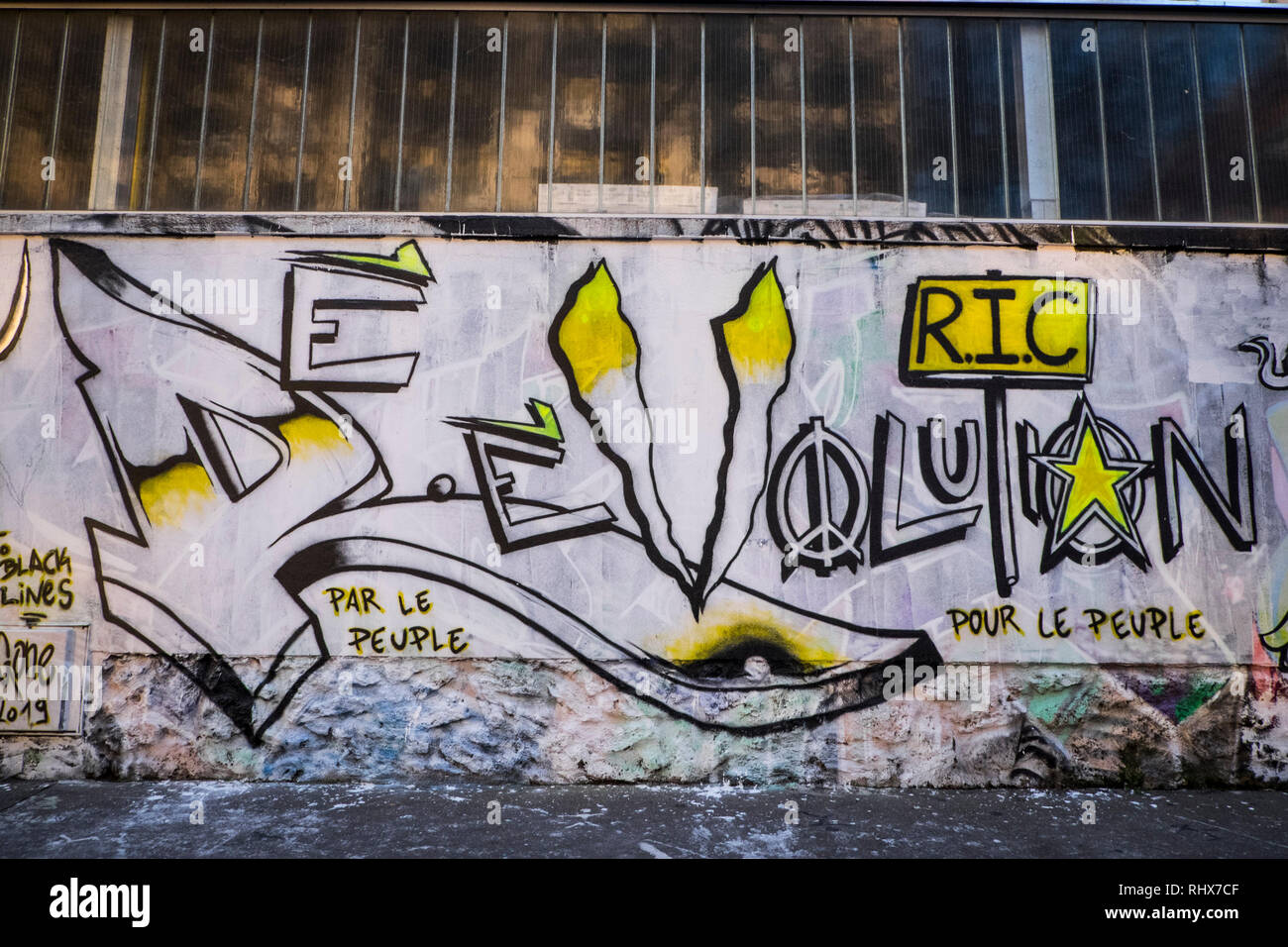 Grafitti representing the word 'Revolution'. 20 artists from the Black ...