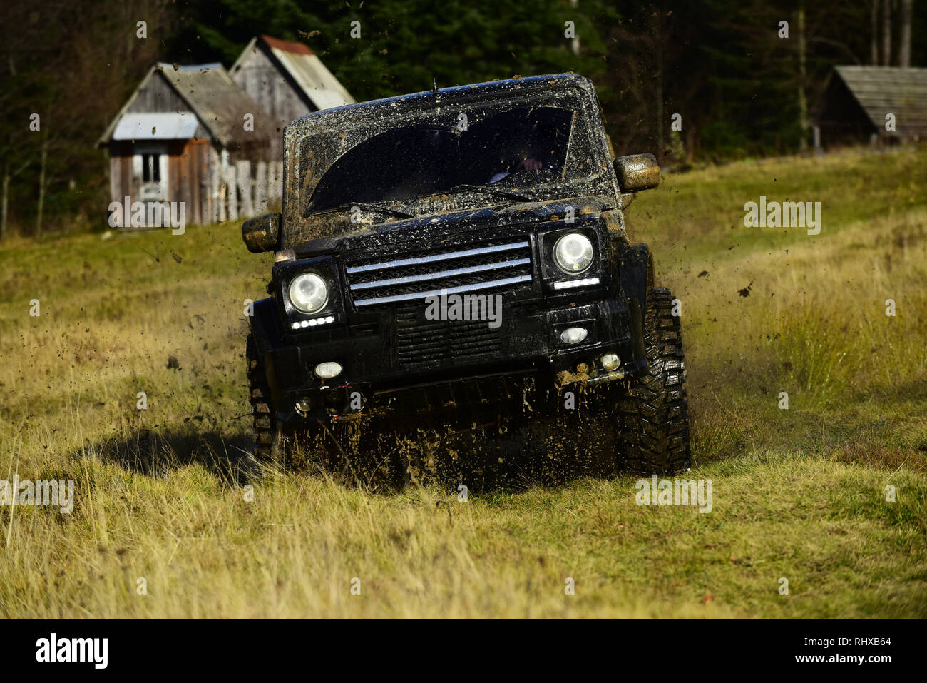 Off road car in black color takes part in racing. Cross country ...