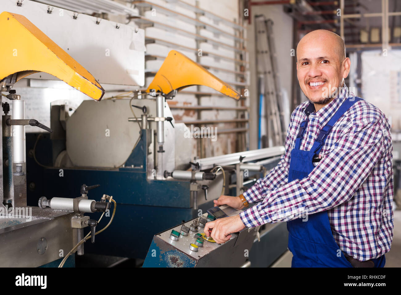 Workman cutting pvc profile hi-res stock photography and images - Alamy