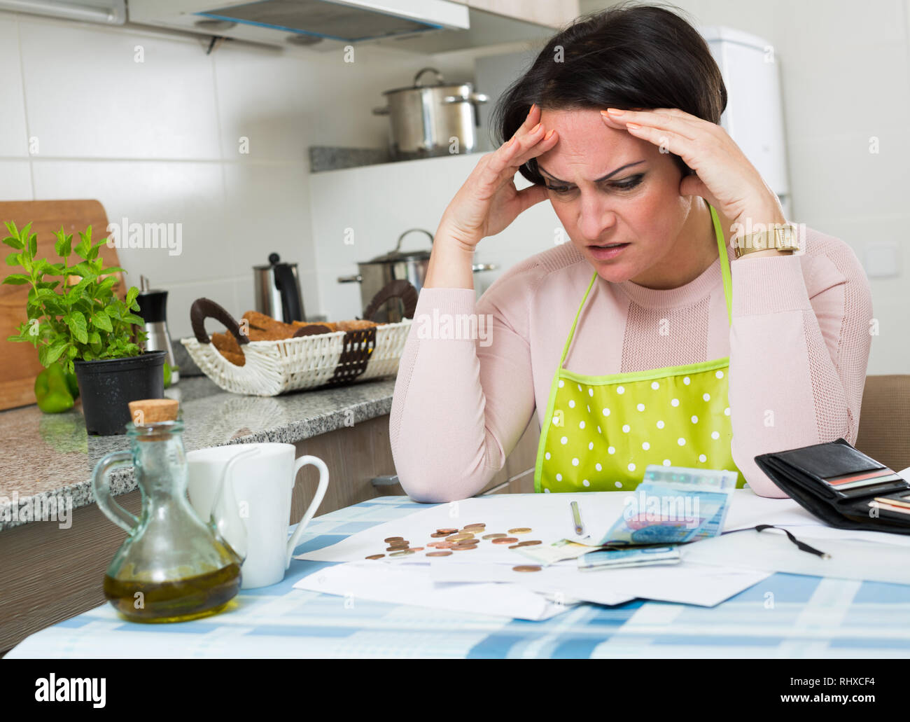 Portrait upset housewife counting hi-res stock photography and images ...