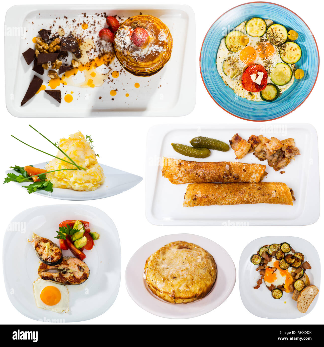Set of various breakfasts served on plates, bowls and slates on white ...