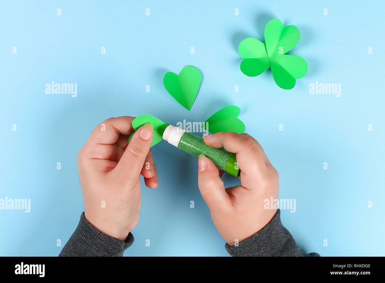 DIY green clover St. Patricks Day on blue background. Gift Idea, decor ...