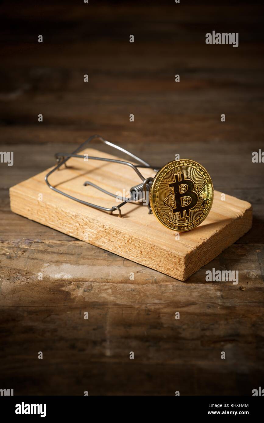Bitcoin on a mouse trap Stock Photo - Alamy