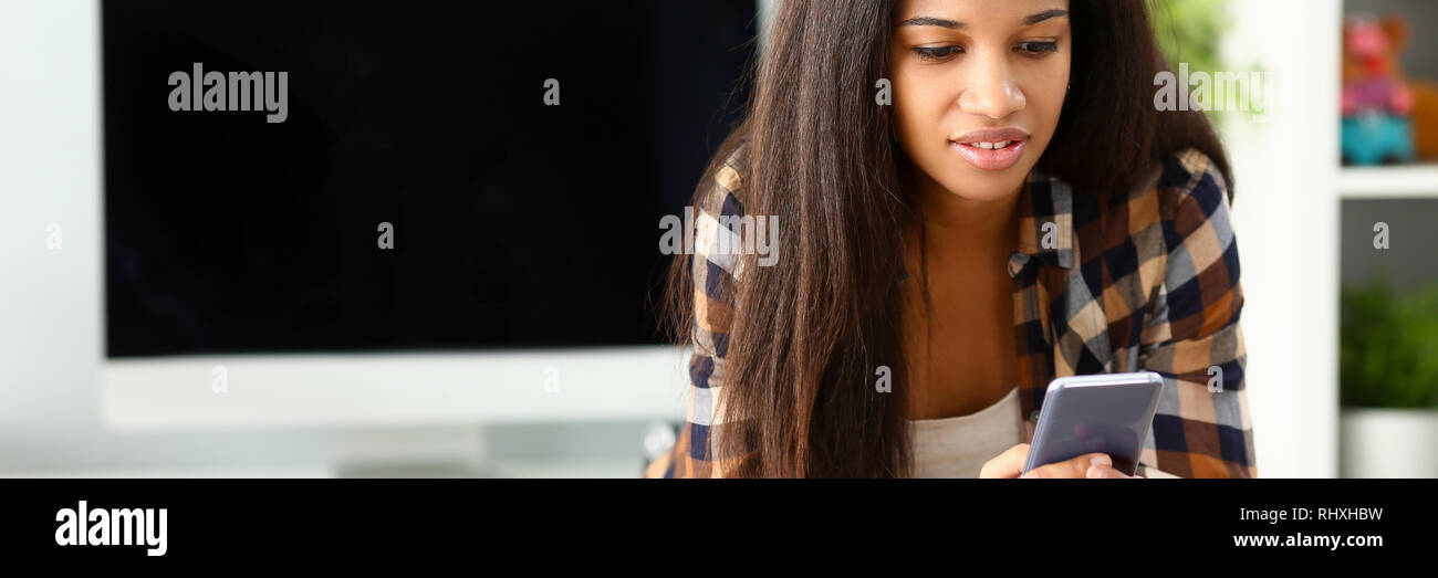 Young beautiful woman look camera holds Stock Photo - Alamy