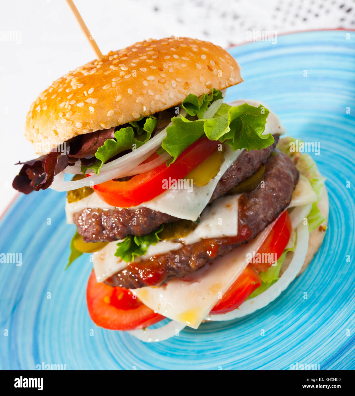 Appetizing double cheeseburger with two grilled beef patties Stock ...