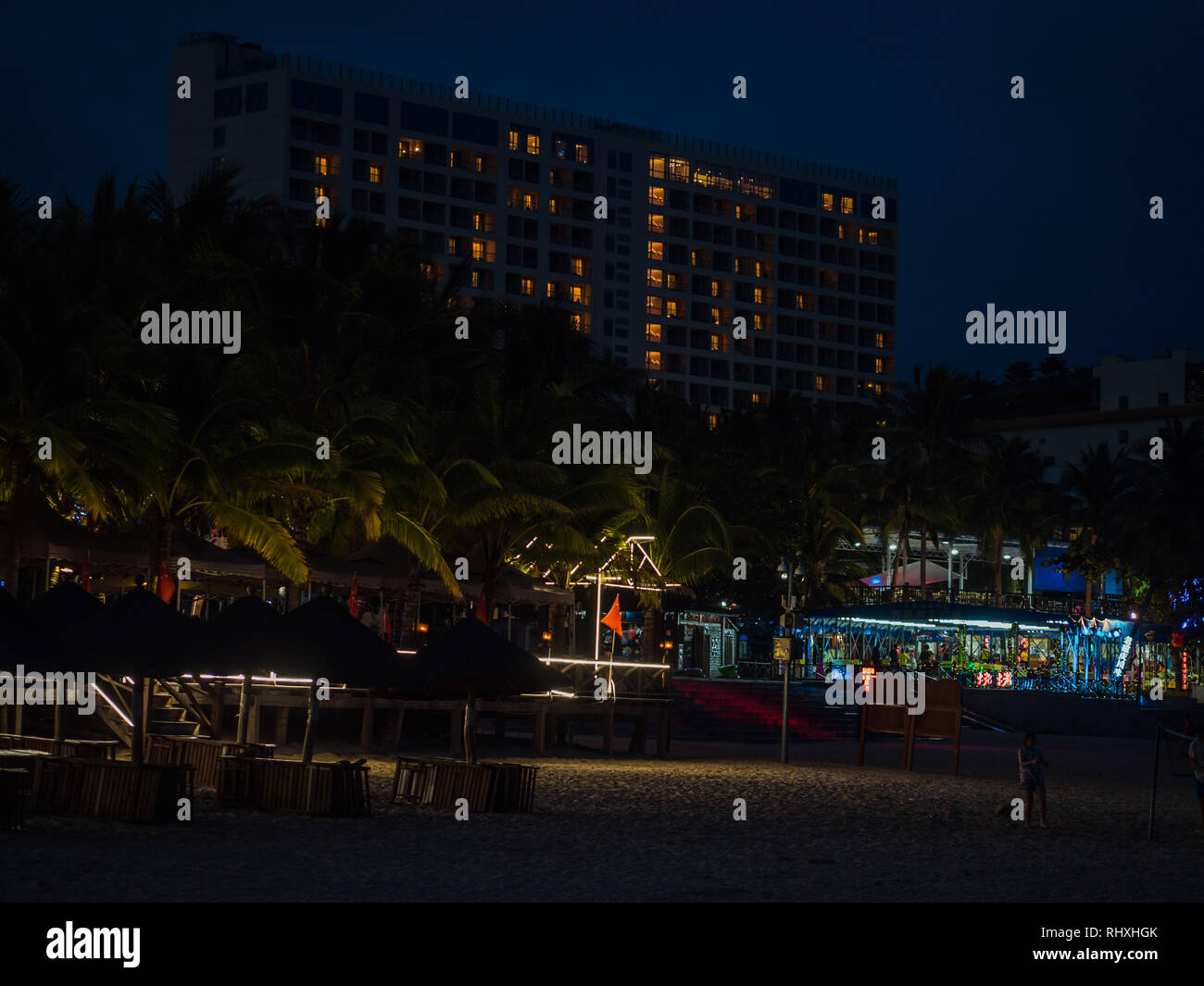 Night beach with cafe Stock Photo - Alamy