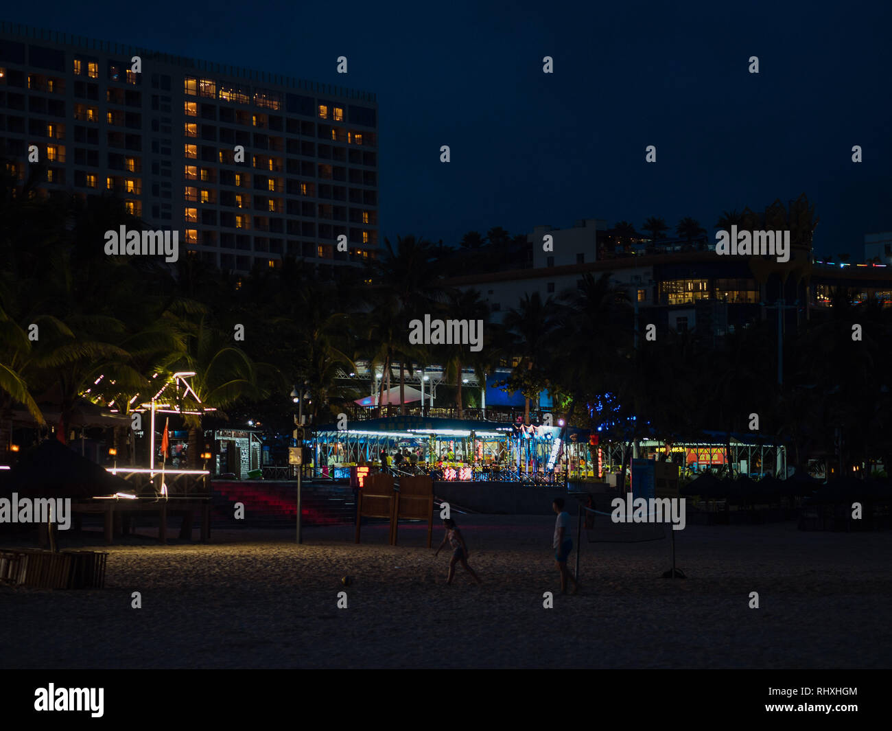 Night beach with cafe Stock Photo - Alamy