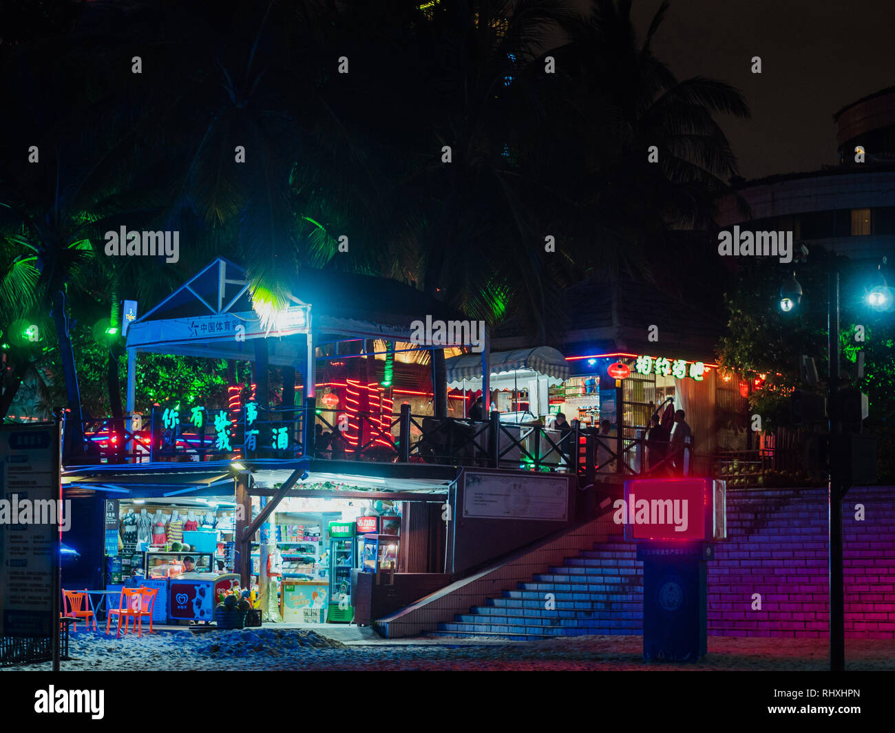 Night beach with cafe Stock Photo - Alamy