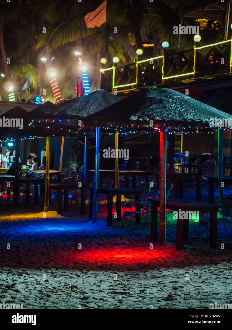 Night beach with cafe Stock Photo - Alamy