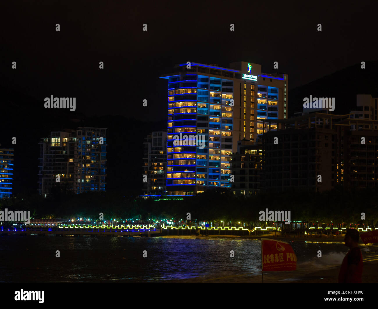 Night beach with cafe Stock Photo - Alamy