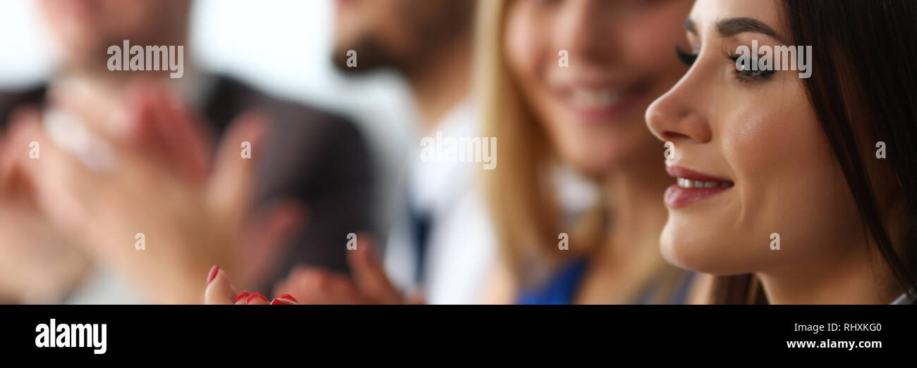 Group of people clap their arm in row Stock Photo - Alamy