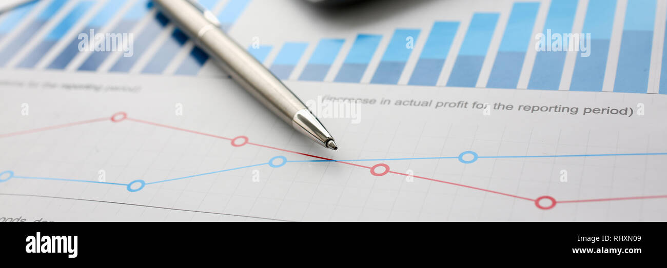 Silver calculator with gray keyboard is lying Stock Photo - Alamy