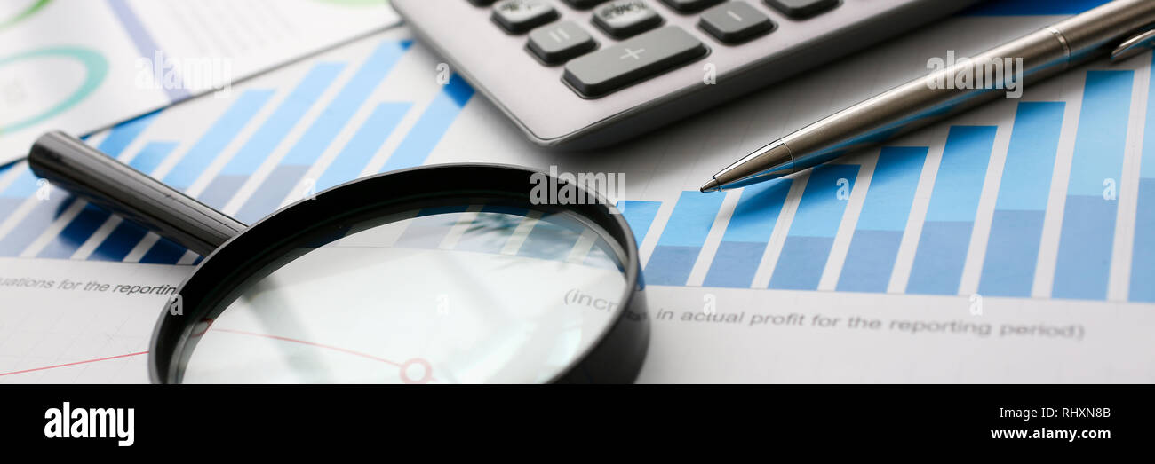 Silver calculator with gray keyboard is lying Stock Photo - Alamy