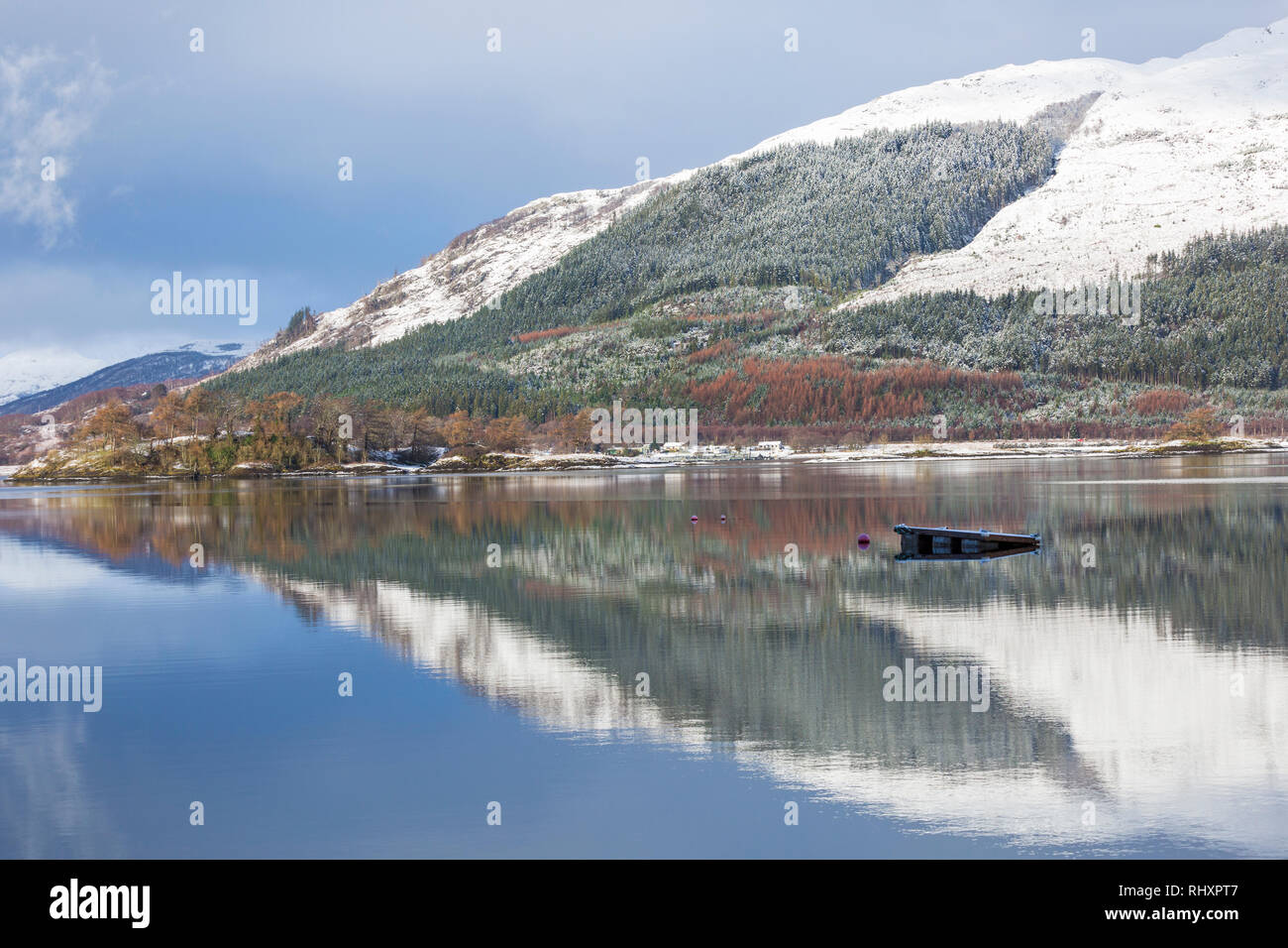 Reflections in Loch Leven on a cold winter morning from Glencoe Village ...