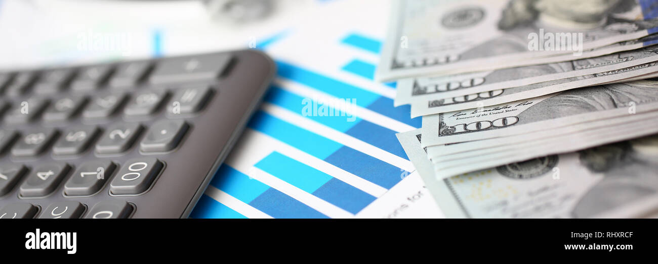 Silver calculator with gray keyboard is lying Stock Photo - Alamy