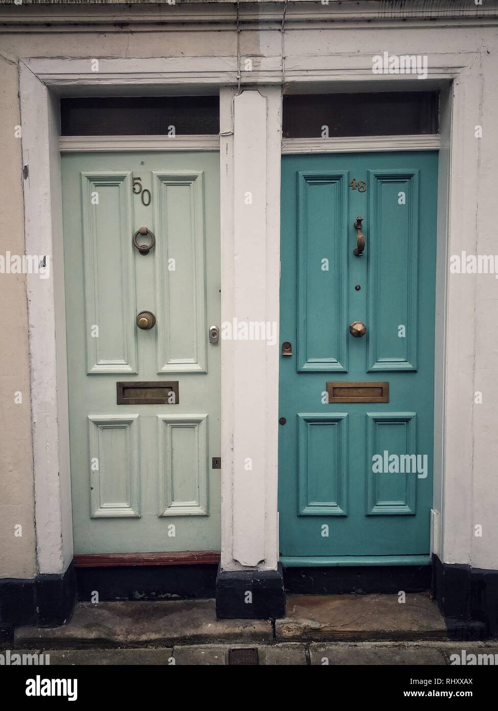 Color image of two doors on a building facade Stock Photo - Alamy