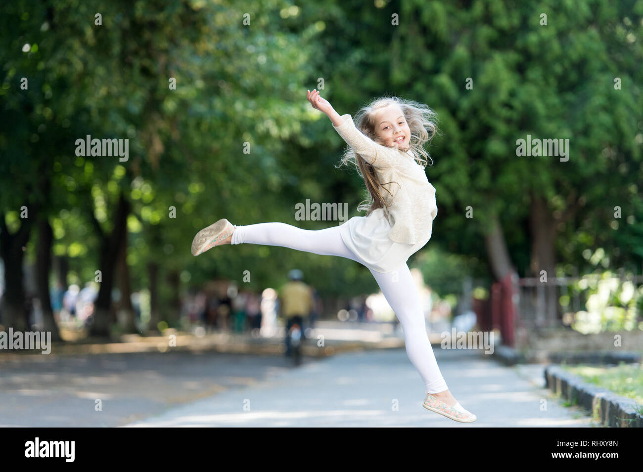 Child happy and cheerful enjoy walk in park. Happiness concept. Kid ...