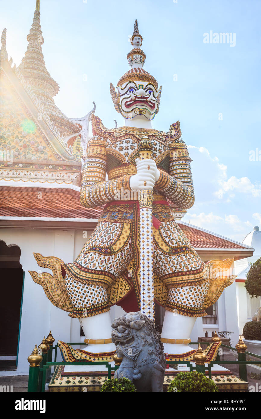 ancient temple guardian in front of Temple of Dawn (Wat Arun Buddhist ...