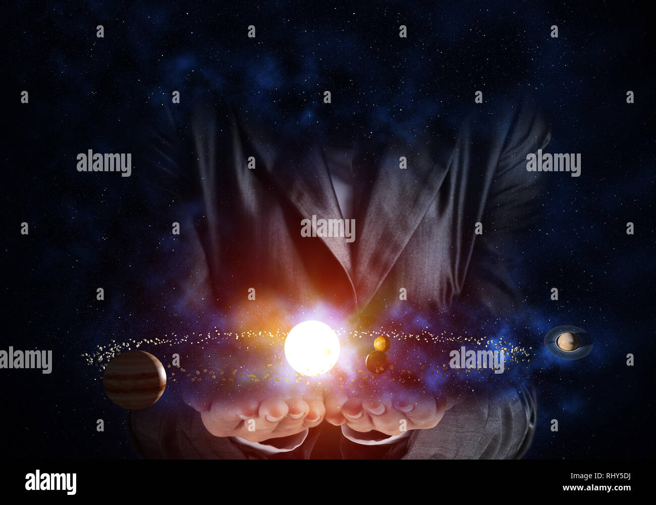 Businessman presenting solar system Stock Photo - Alamy