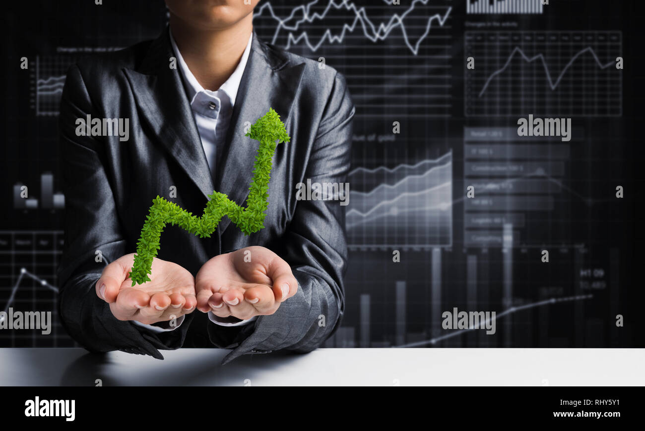 Businessman presenting growing graph Stock Photo - Alamy