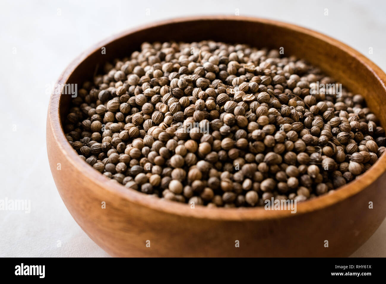 Organic Dried Coriander Seeds in Wooden Bowl. Natural Product Stock ...