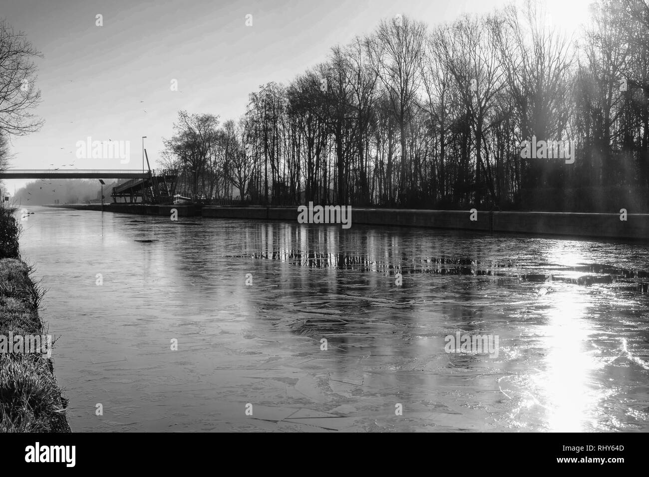 Dramatic and monochrome sunrise over a Beautiful early winter landscape ...