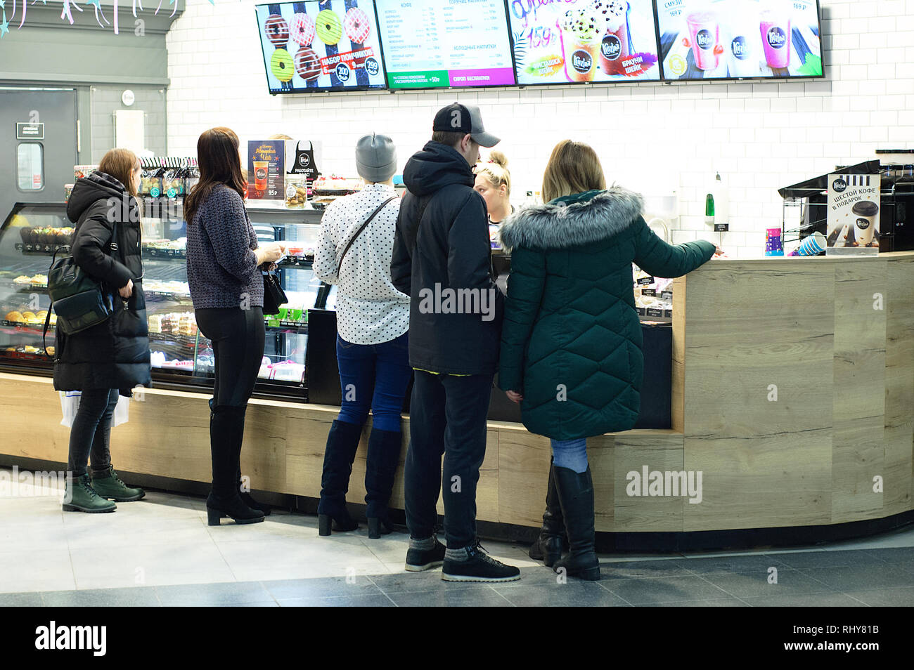 Novosibirsk 12-20-2018. People at the window in the cafe pastry fast ...