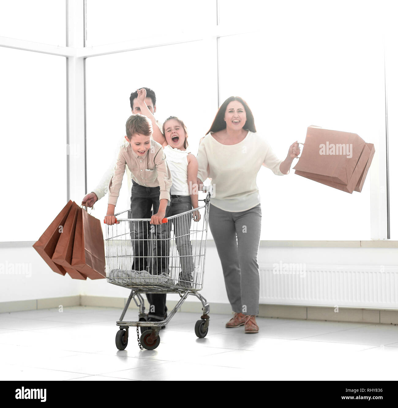 Shopping family husband Cut Out Stock Images & Pictures - Alamy