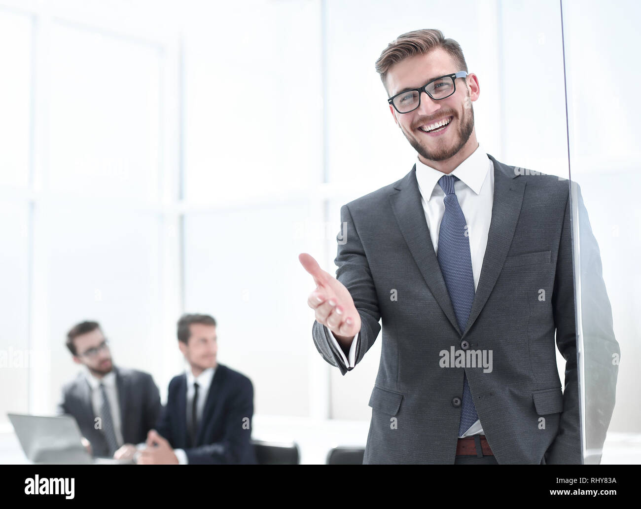 Businessman reaching out hand handshake hi-res stock photography and ...