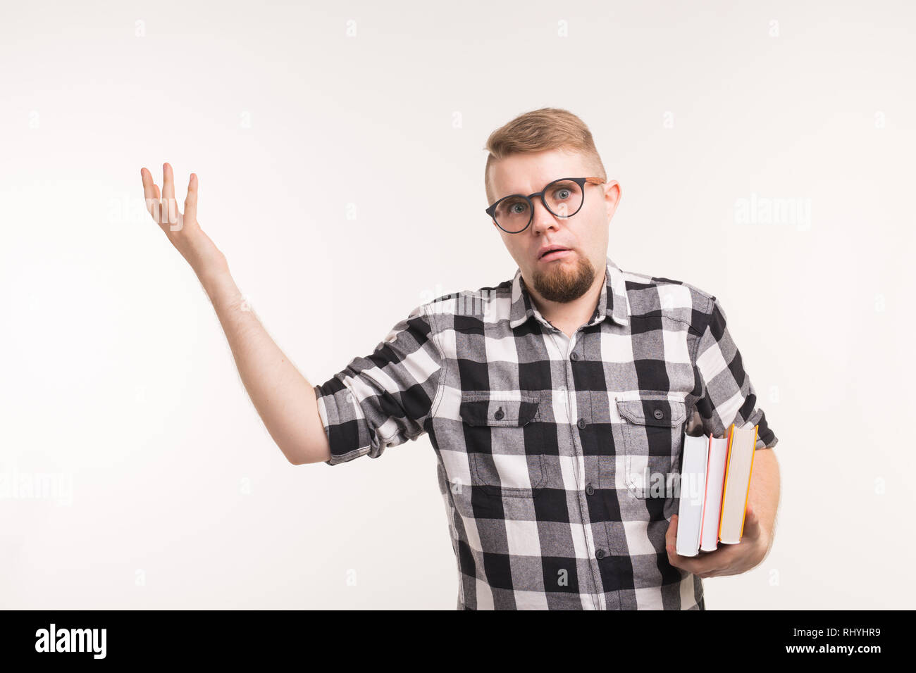 Education, emotions, geek and nerd concept - man in glasses and books ...