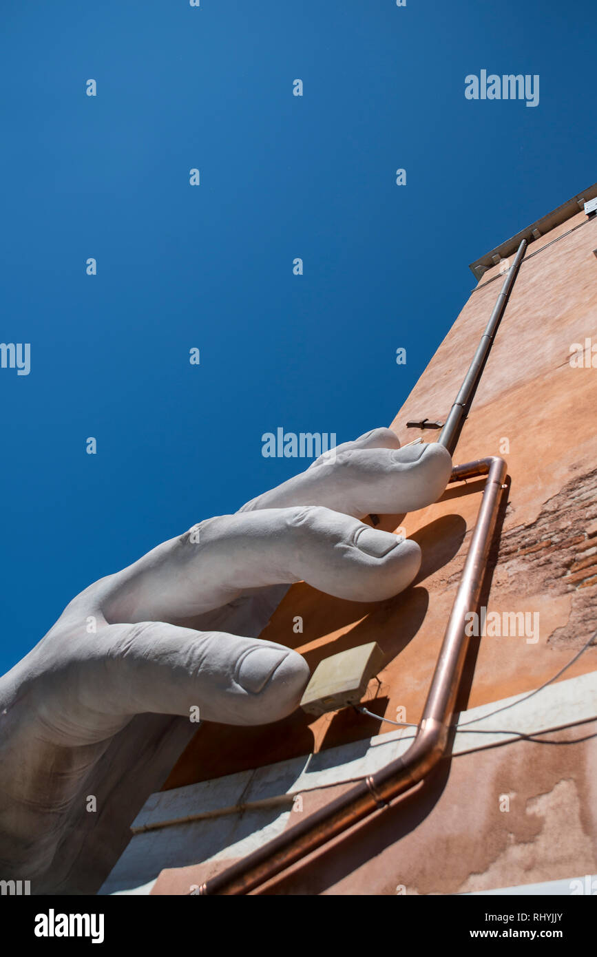 Giant hands art installation called Support in 2017 Venice Biennale ...