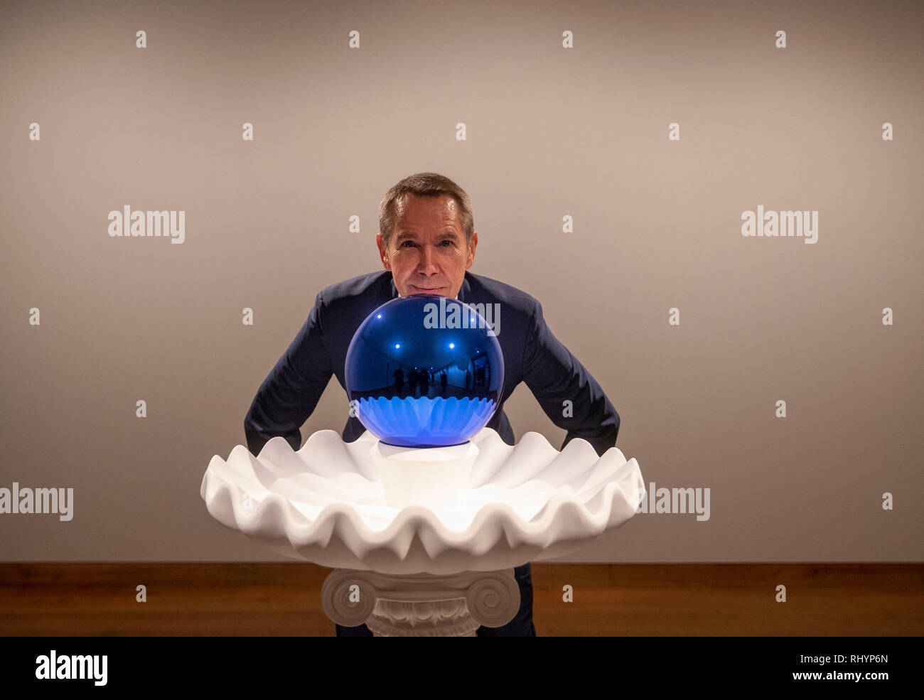Artist Jeff Koons poses next to his piece called Gazing Ball (Birdbath ...