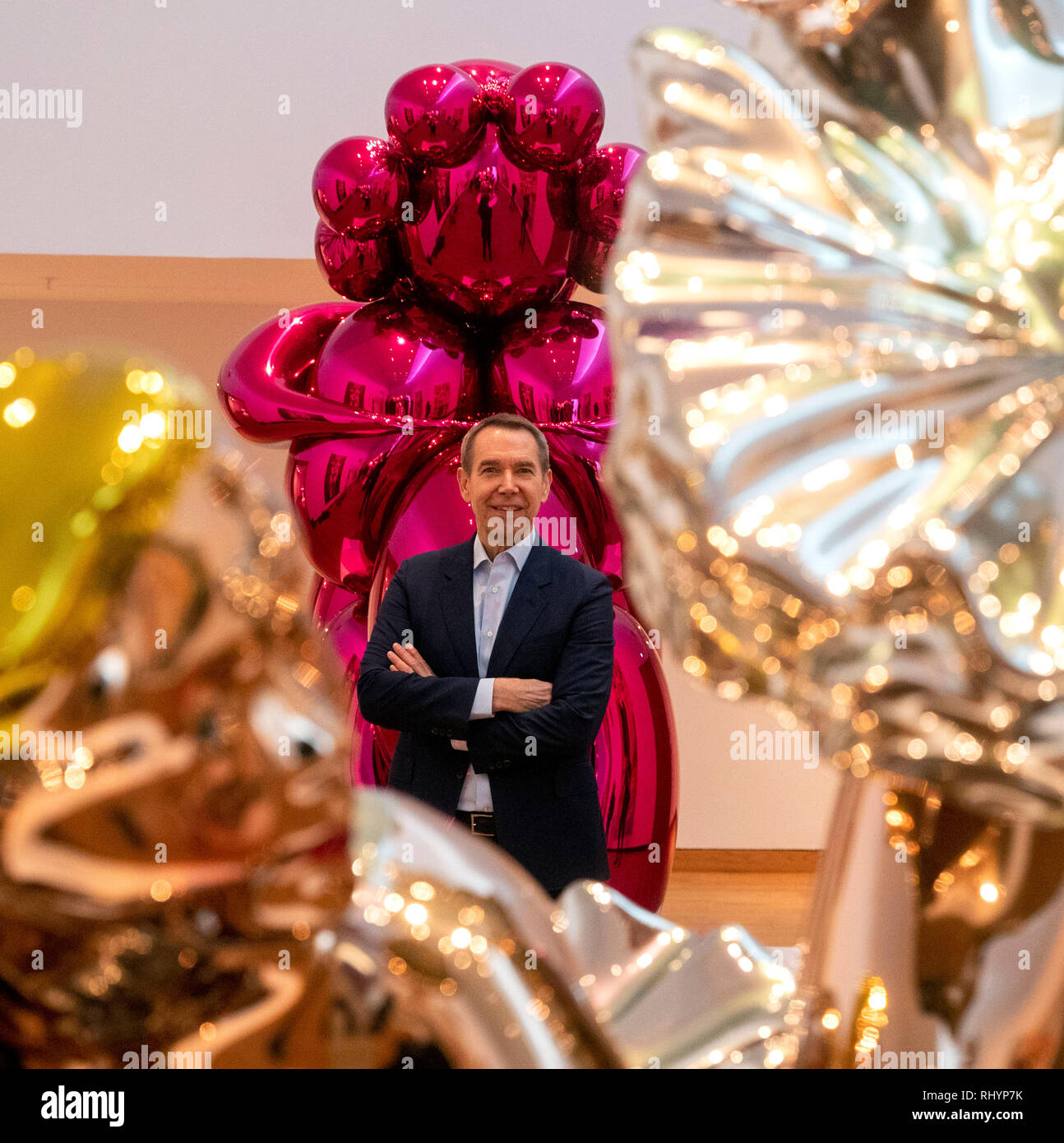 Artist Jeff Koons poses next to his artwork during a photo call ahead ...