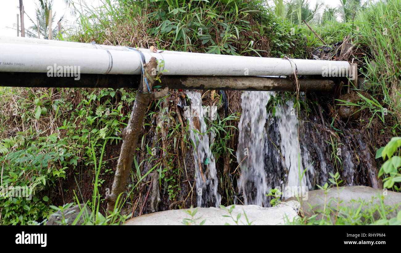 leaky drinking water pipe Stock Photo - Alamy