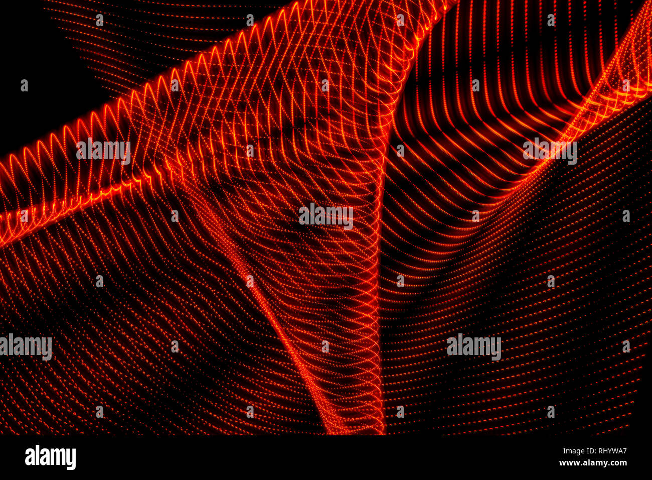 Abstract curved shapes of red color on black background. Abstract ...