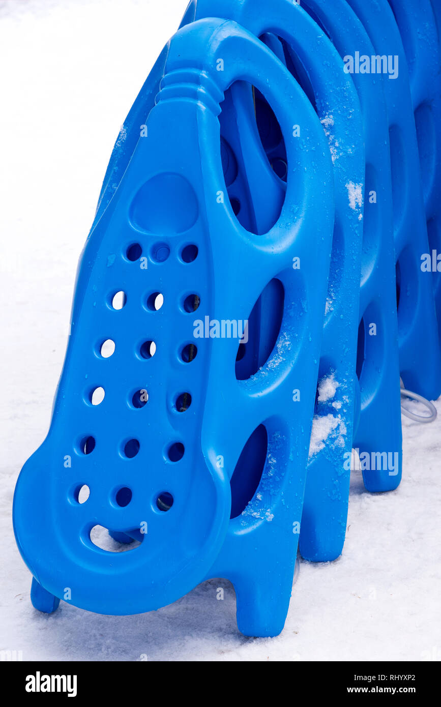 Colorful sleds for kids for sledding Stock Photo - Alamy