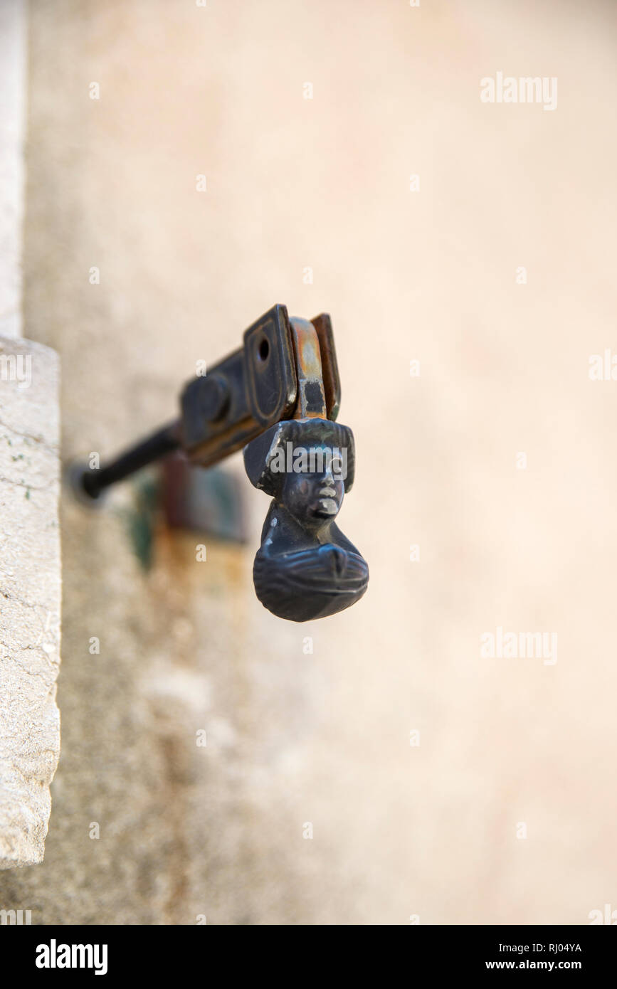 Traditional shutter holders, Venice, Italy Stock Photo - Alamy