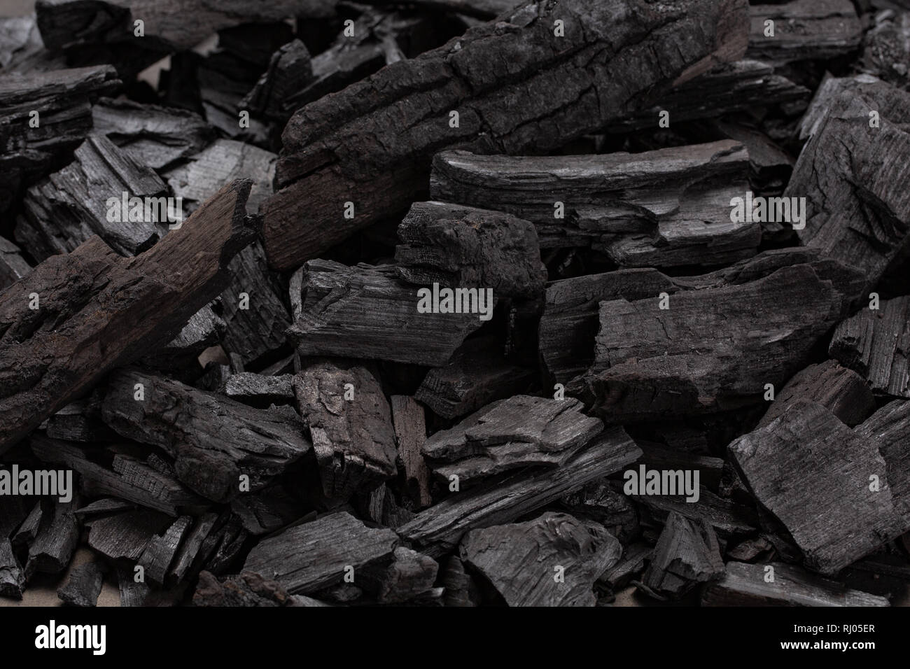 the black embers after burnt campfire closeup Stock Photo - Alamy