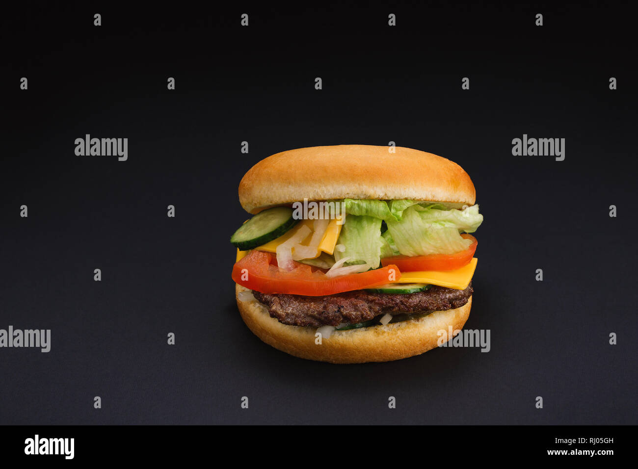 the fresh Delicious burger over black background Stock Photo - Alamy