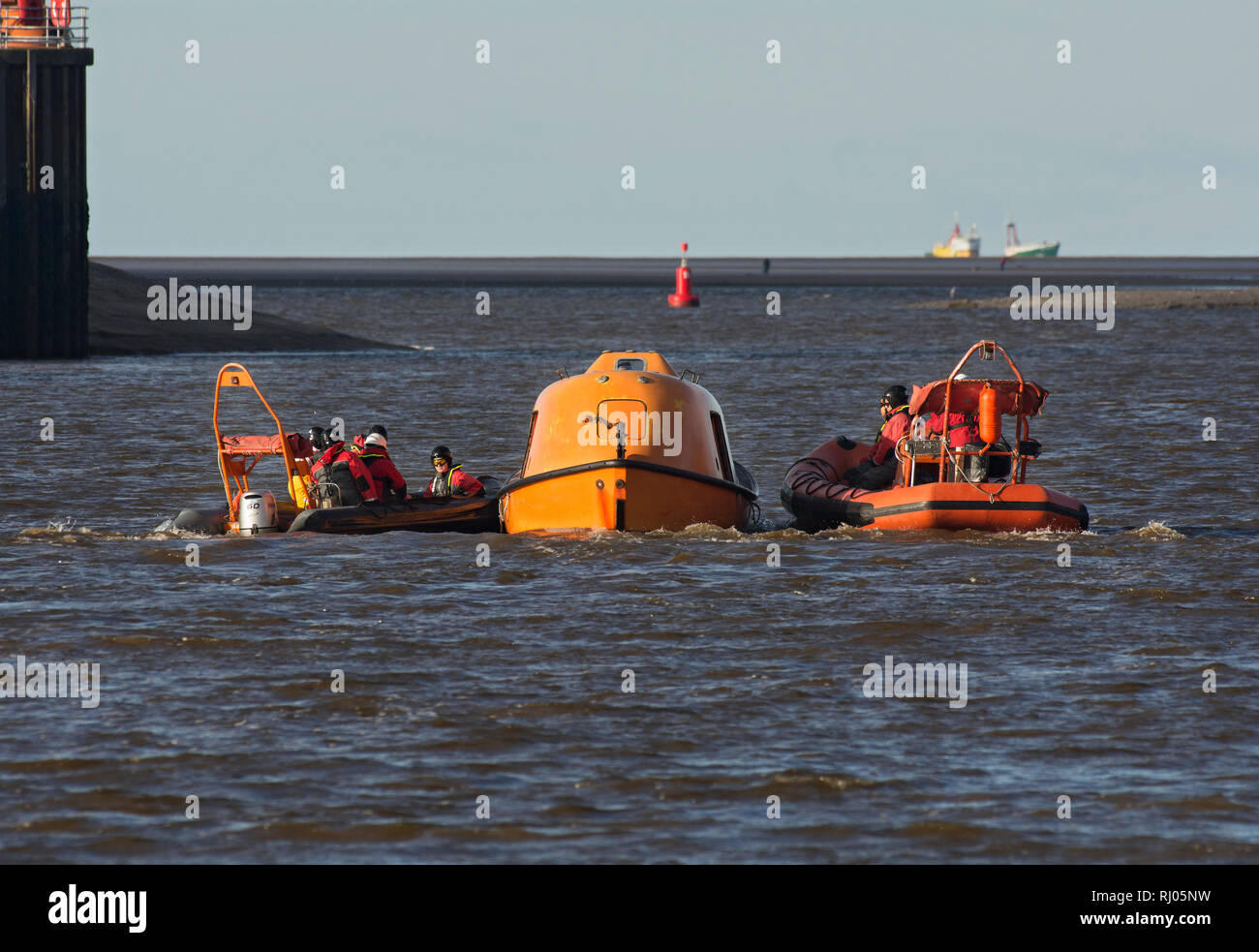 RNLI Lifeboat crew, training in Wyre Estuary, Fleetwood Stock Photo - Alamy