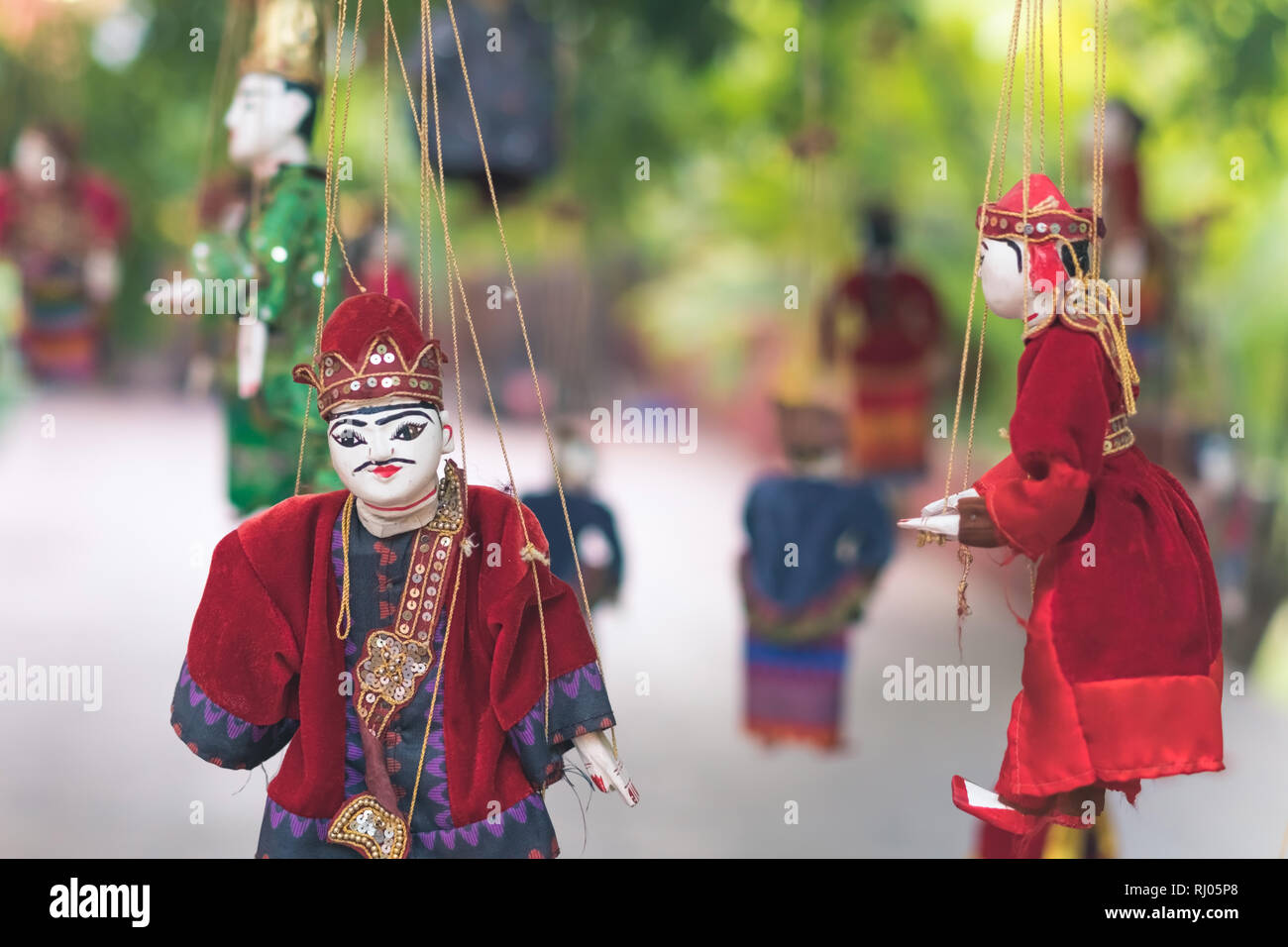 Traditional handicraft puppets for sale in the ancient pagoda in Bagan ...