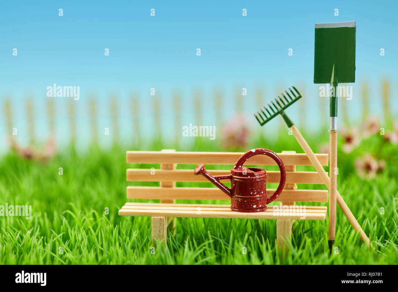 Gardening tools in garden Landscape in summer or spring Stock Photo - Alamy