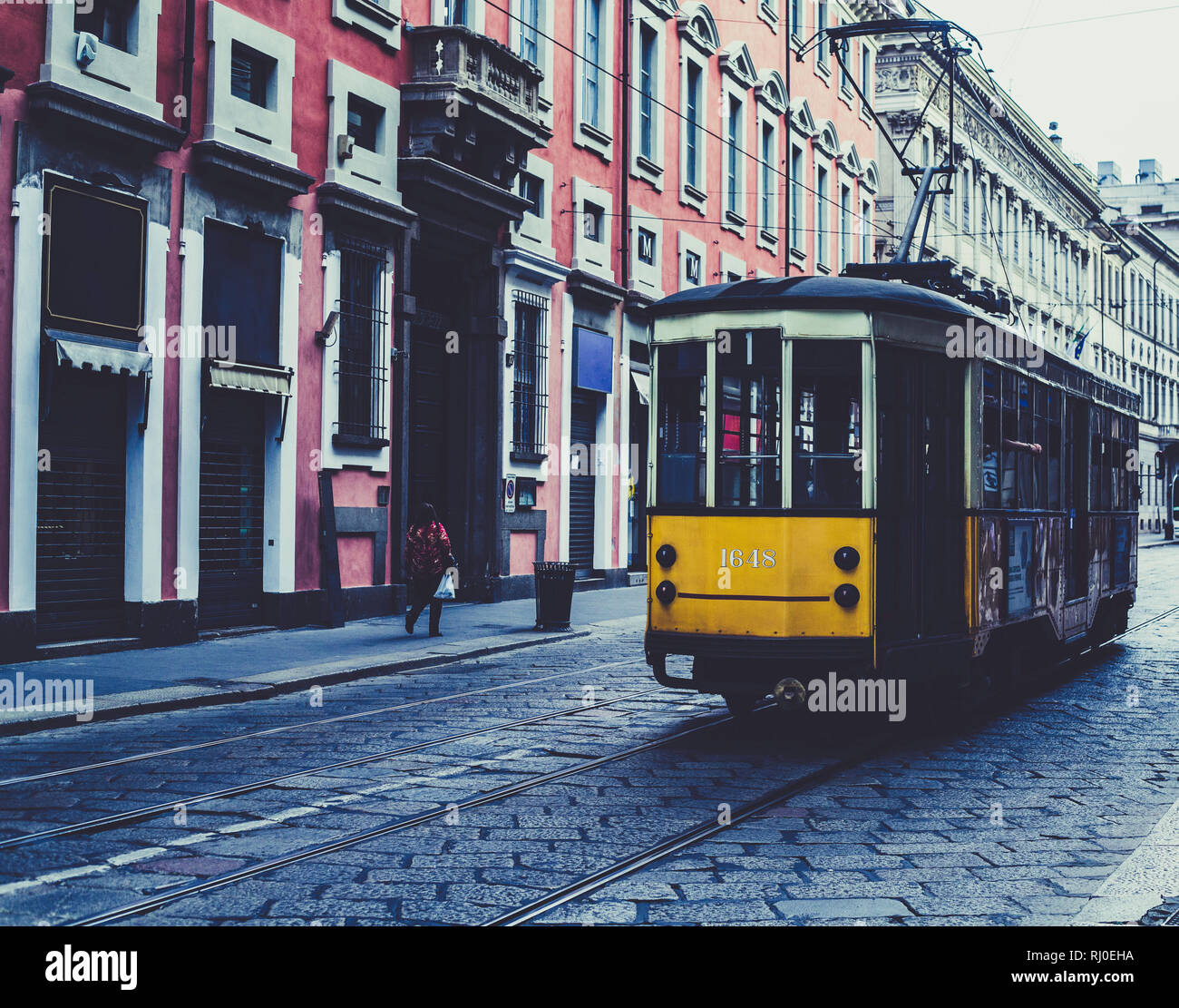 Old yellow tram in the streets of Milan, Italy Stock Photo - Alamy