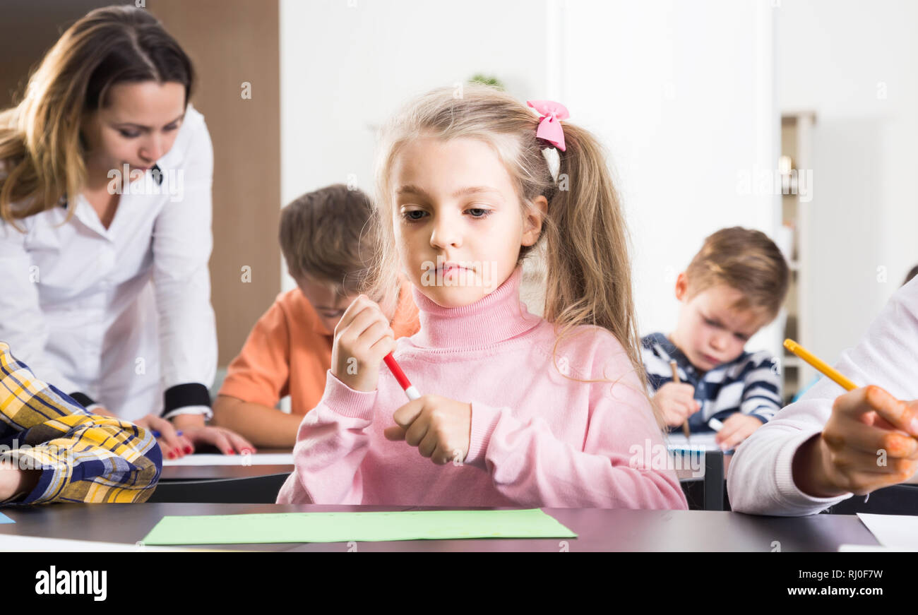positive american children of elementary age having class of art Stock ...