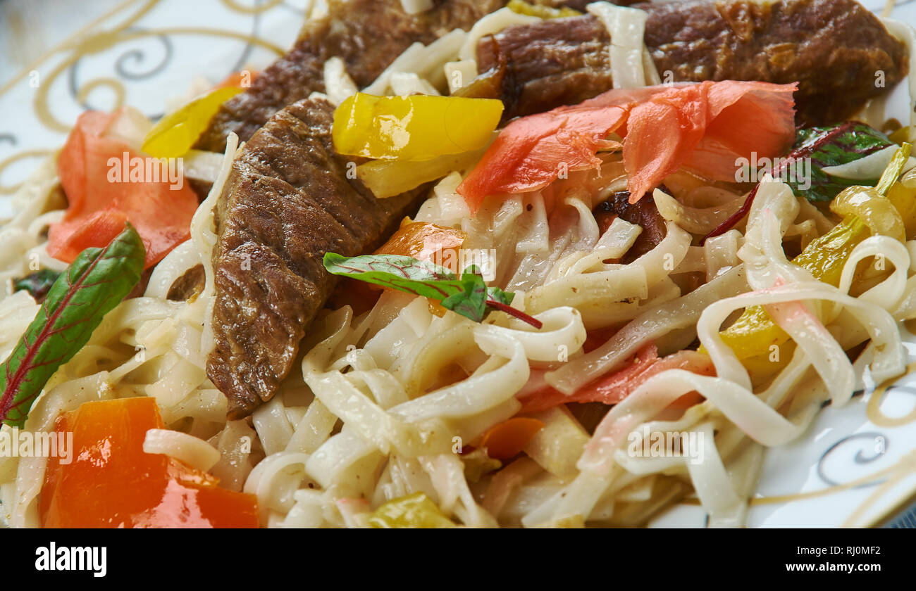 Lagman, Central Asian dish of pulled noodles, meat, and vegetables ...