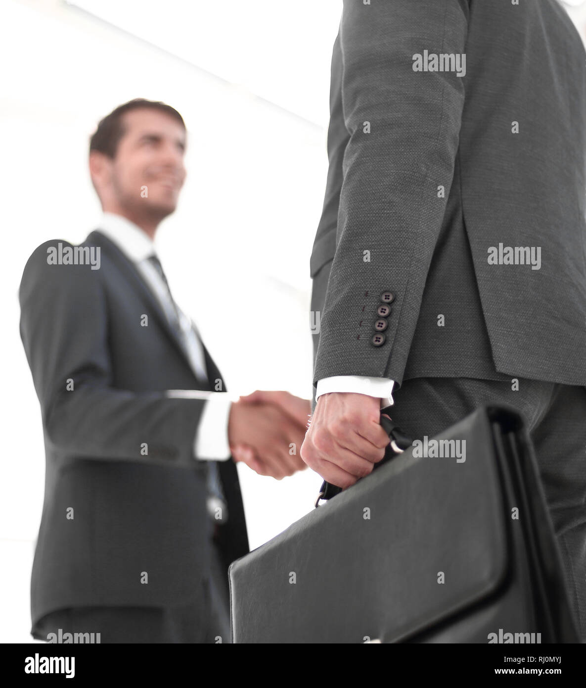 Business meeting hand shaking blur hi-res stock photography and images ...